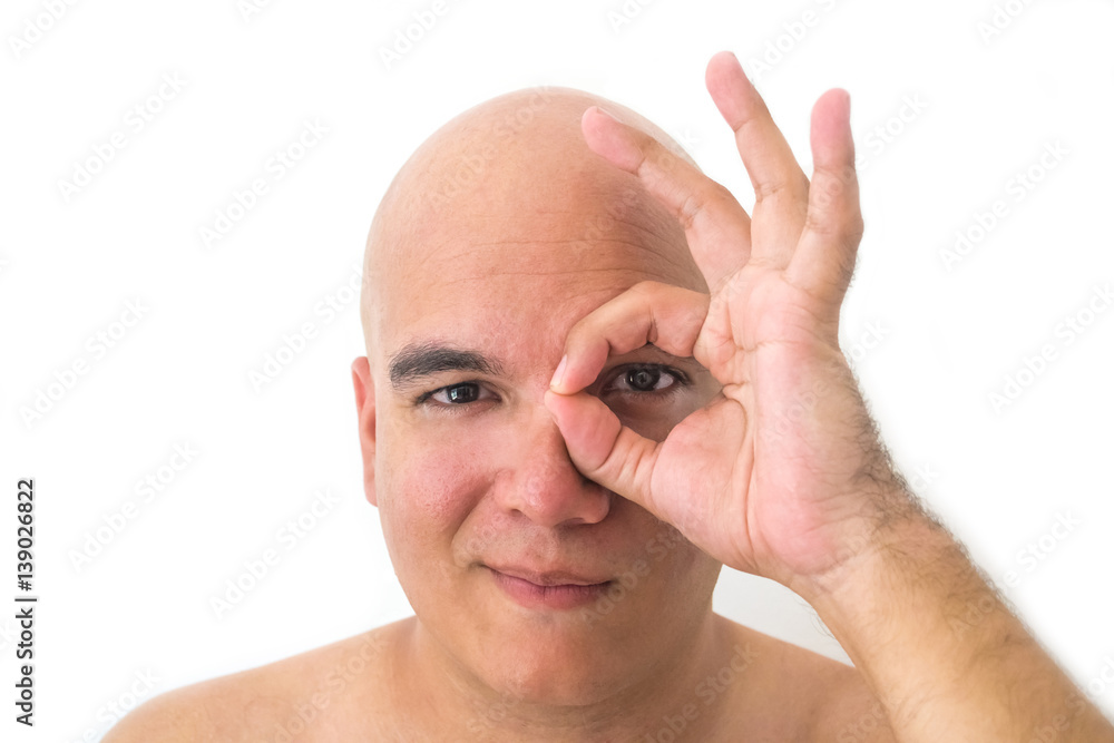 Face of a bald man in white background. With a hand on one eye. Stock ...