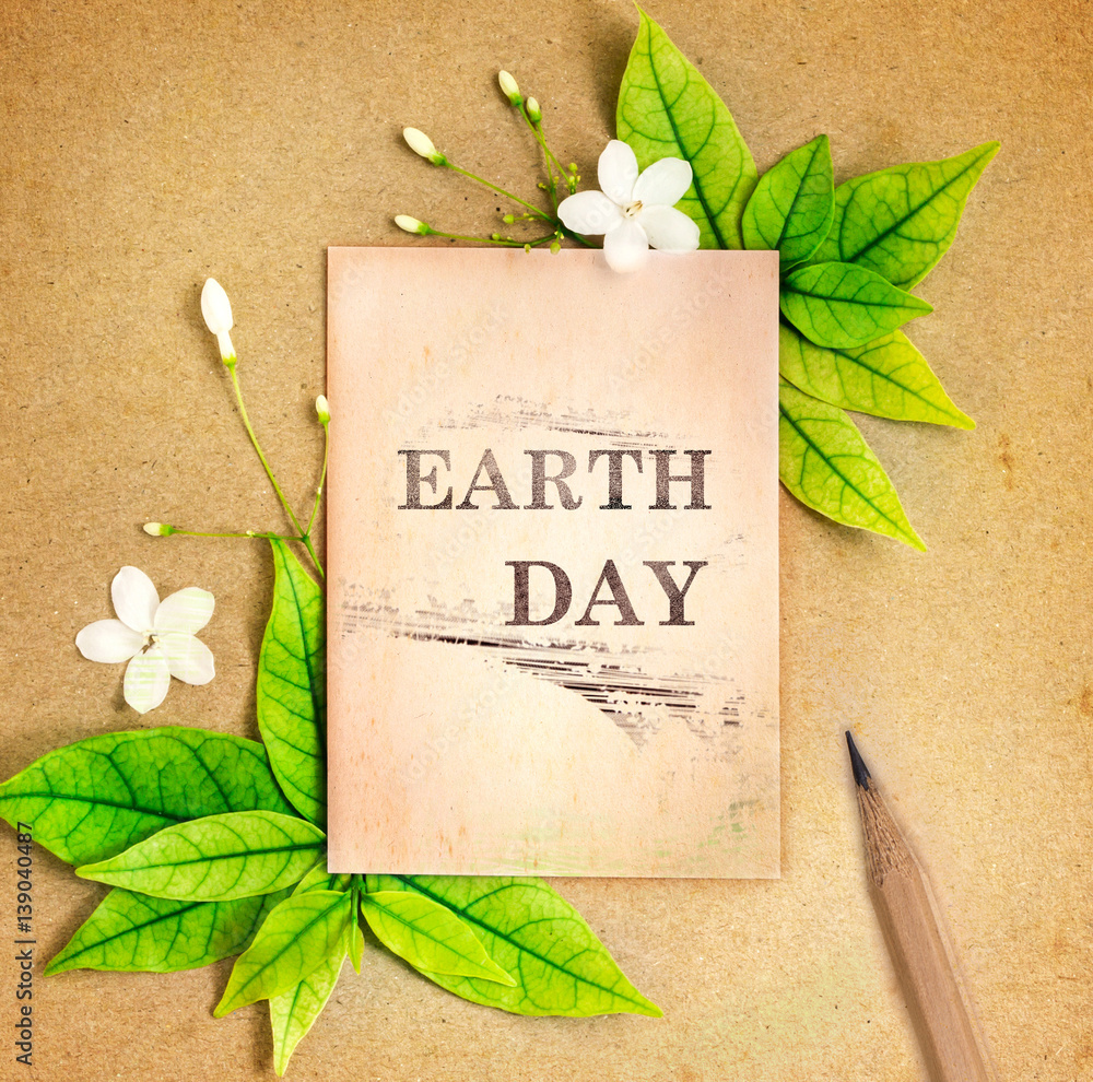 Earth Day paper sheet with fresh spring green leafs border frame on ...
