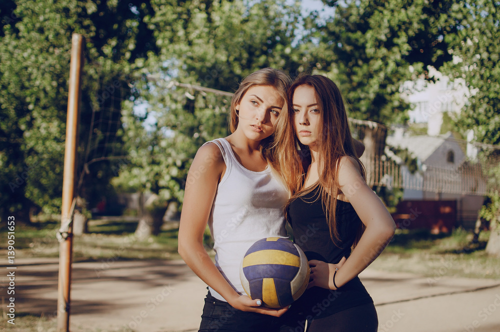 Girls with ball Stock Photo | Adobe Stock