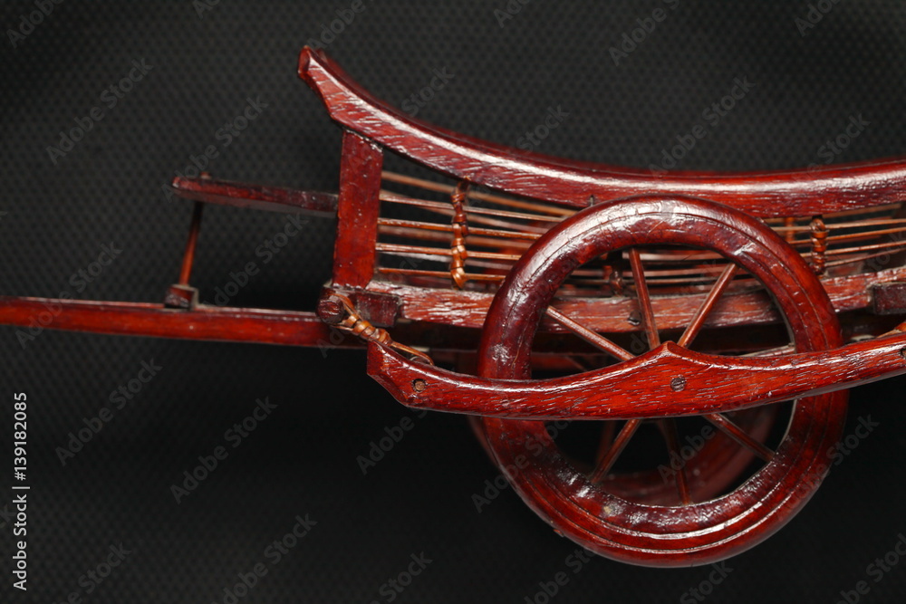 The traditional miniature wooden model of thai style cart represent the ...