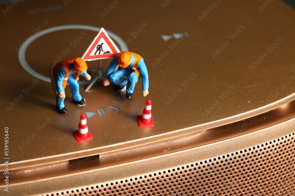 The round power button of the loudspeaker with maintenance miniature ...