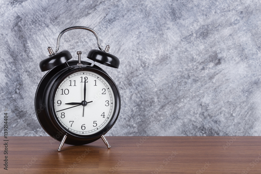9 o'clock vintage clock on wood table and wall background Stock Photo ...