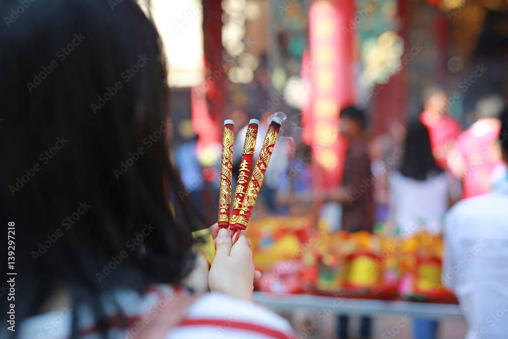 People pray respect with Incense burning for god in Chinese New Year ...