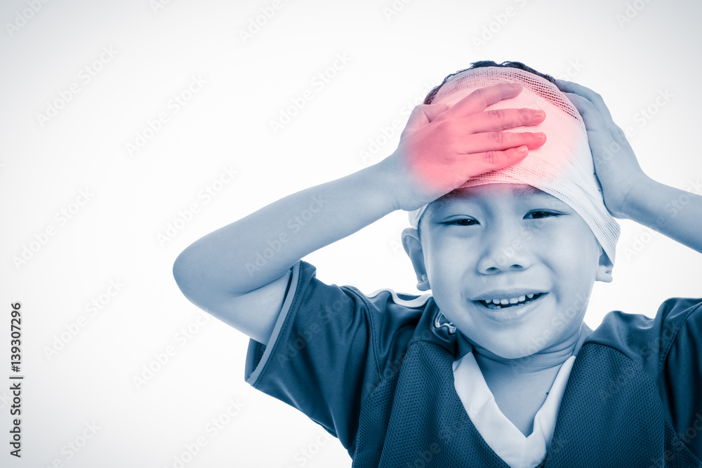Sports injury. Asian child with trauma of the head painful crying ...