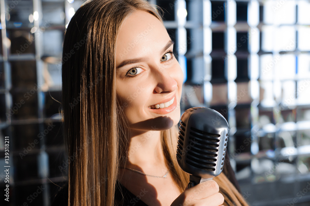 Beautiful Singing Girl. Beauty Woman with Microphone. Glamour Model ...