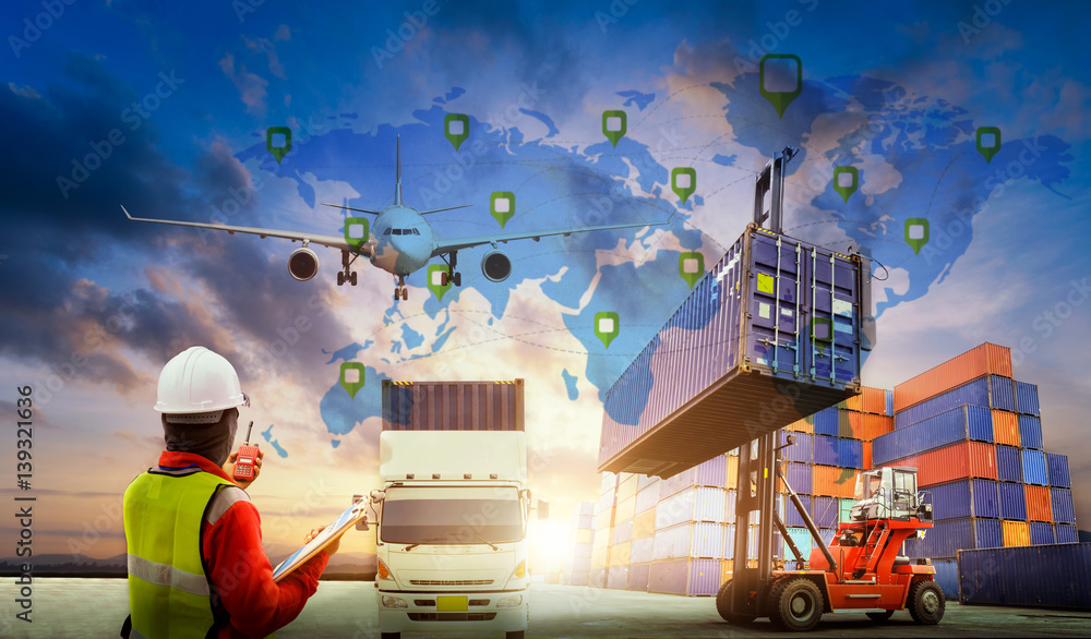 Container Cargo freight ship with working crane bridge in shipyard at ...