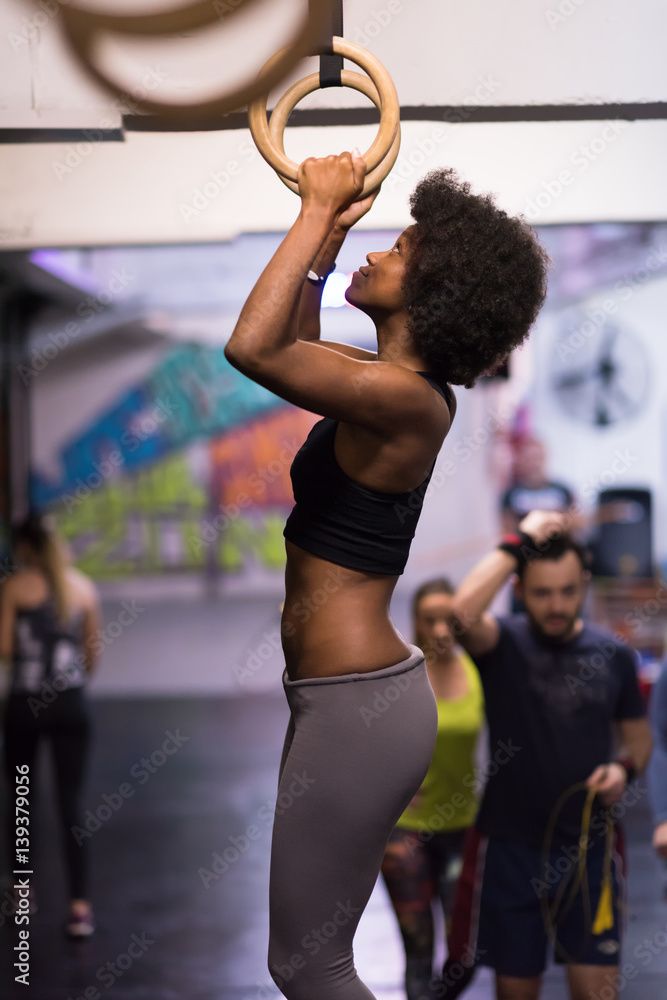 black woman doing dipping exercise Stock-Foto | Adobe Stock