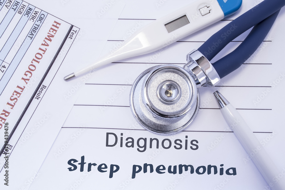 Diagnosis of strep pneumonia. Stethoscope, electronic thermometer ...