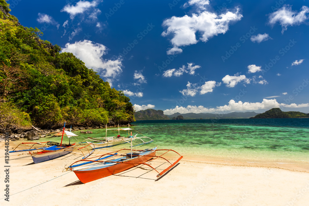 Banca boat at a beautiful tropical beach in Palawan Island,Phili Stock ...