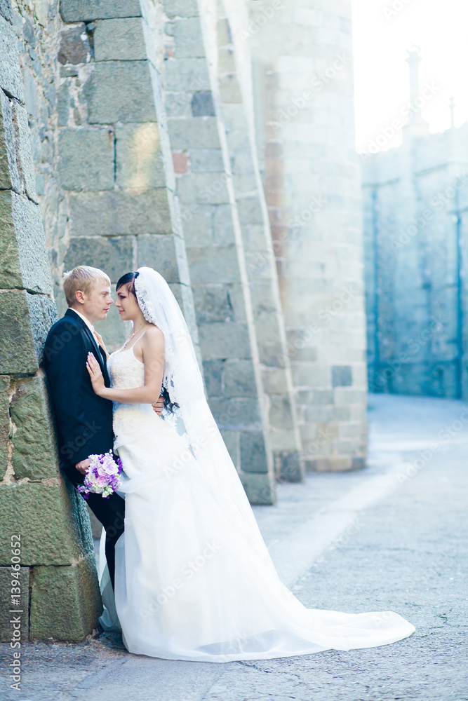 Bride and groom at wedding Day walking Outdoors on spring nature ...