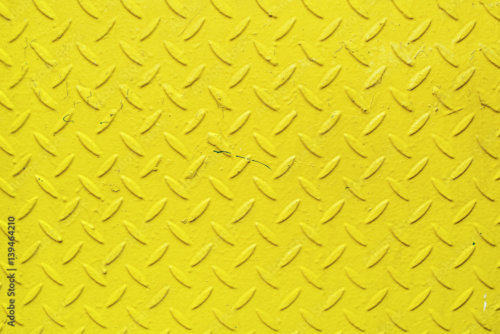 Yellow metal texture with a pattern in the form of lines and petals ...