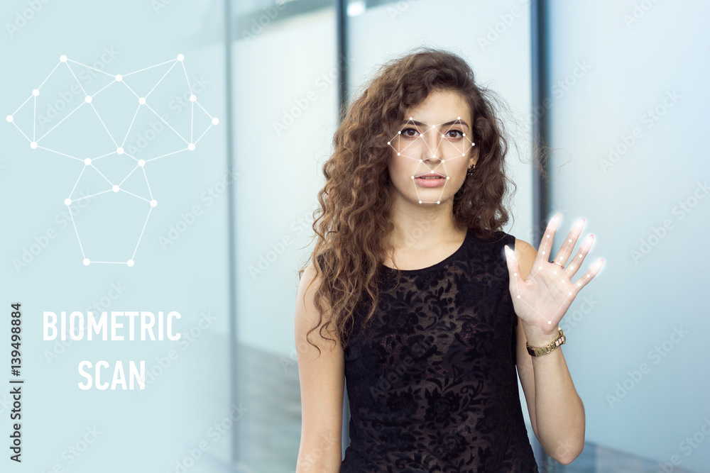 Frightened curly girl holds open hand, biometric scan. Scanning of ...