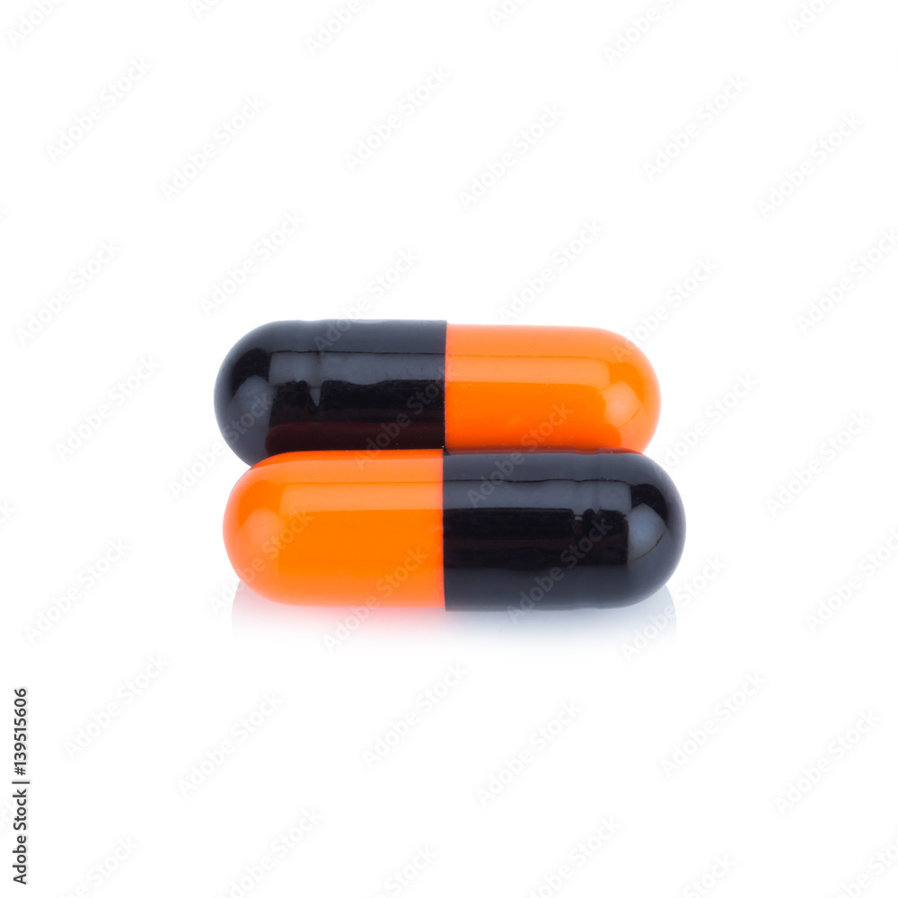 Two capsule color Black and Orange isolated on white background Stock ...