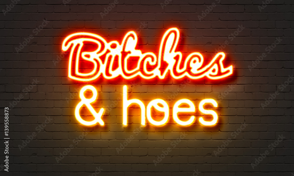 Bitches & hoes neon sign on brick wall background. Stock Illustration ...