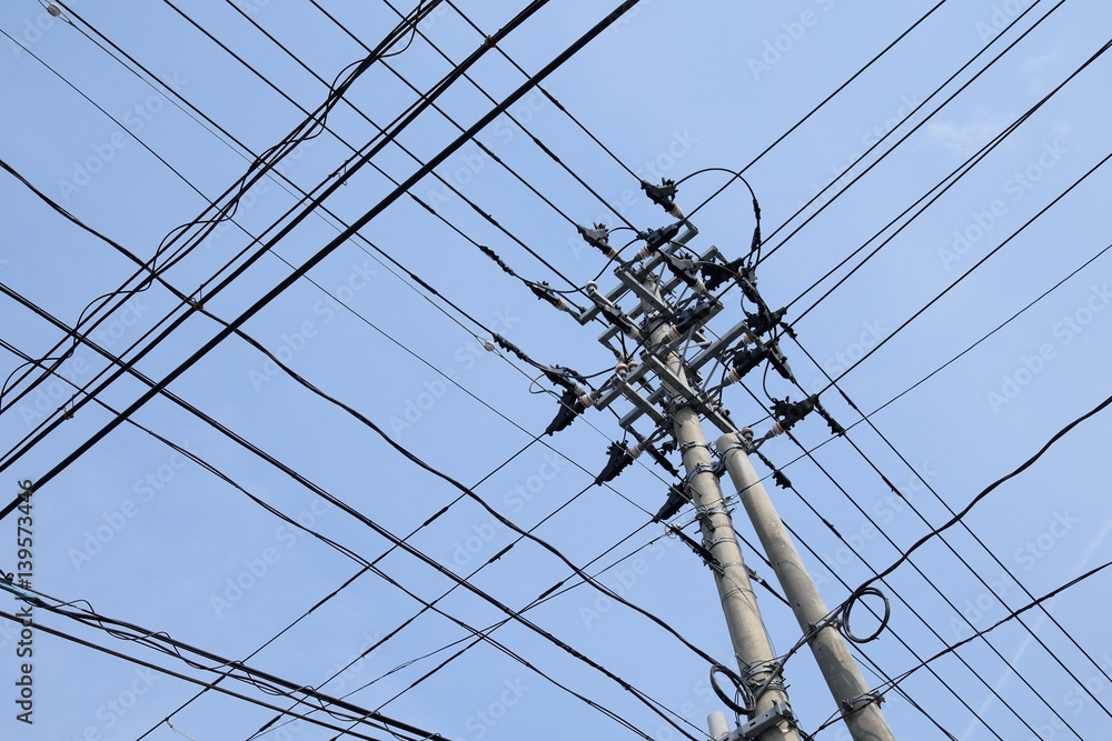 The utility poles which supports many electric wires. Stock Photo ...