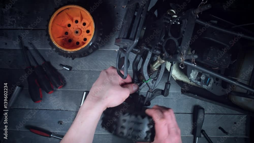 4K Technical Shot Of Mechanic Taking of Tyres from RC Car Stock Video ...