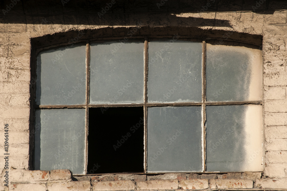 Shabby dirty grunge window of neglected and abandoned old industrial ...