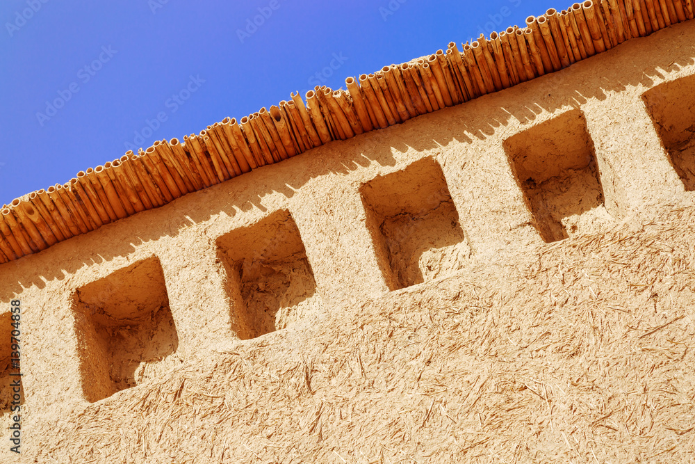 Rammed earth wall with beautiful blue sky Stock Photo | Adobe Stock
