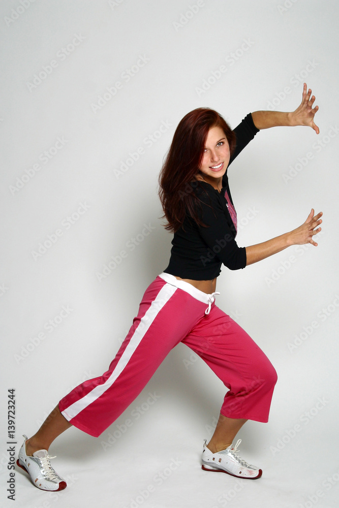 Fitness woman pushing Stock Photo | Adobe Stock
