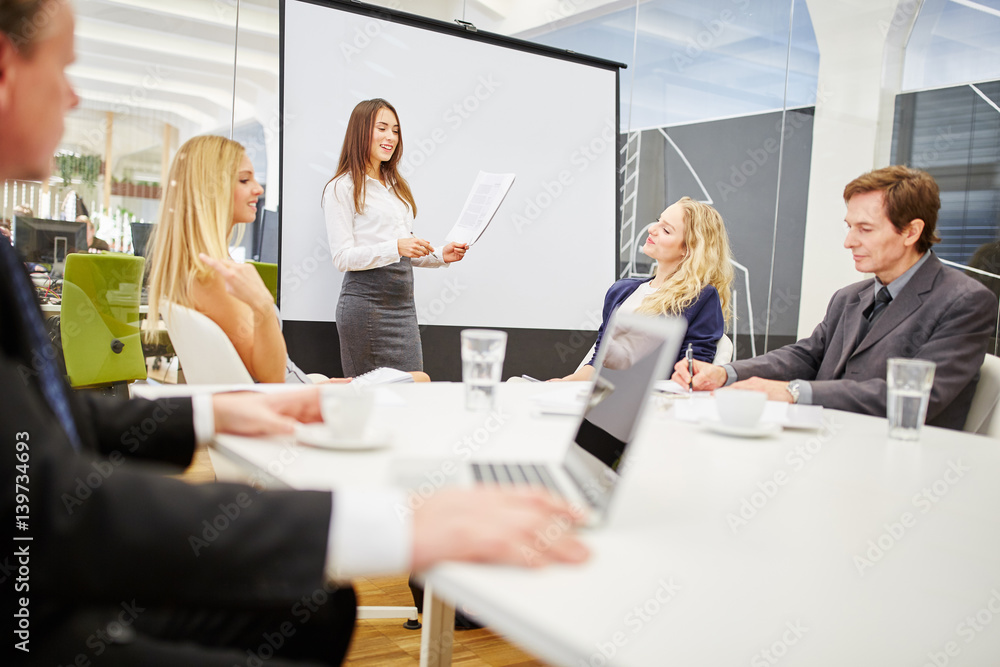 Woman in a presentation Stock Photo | Adobe Stock