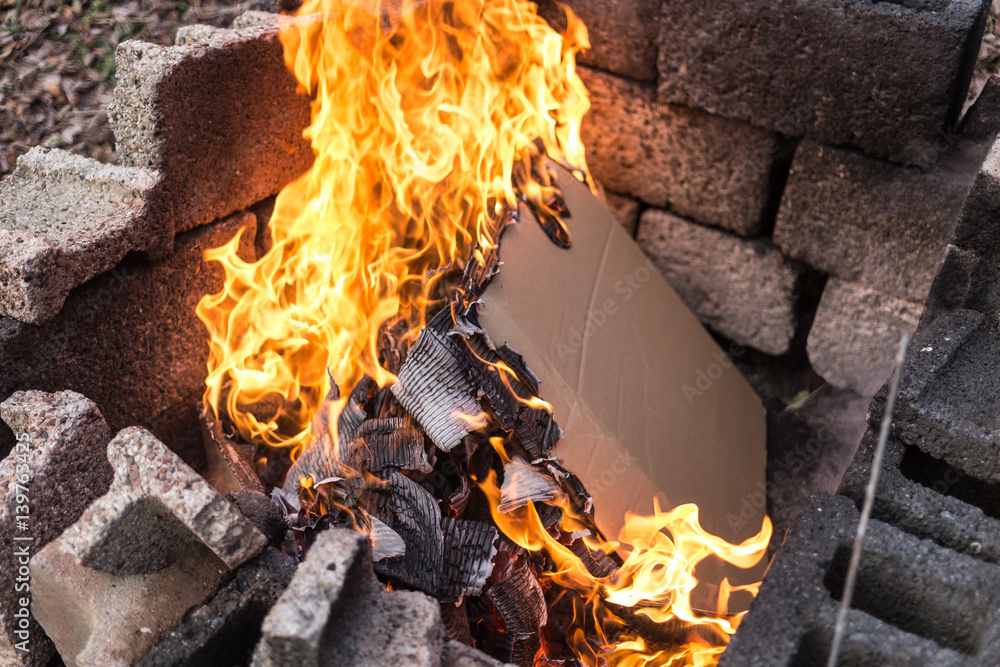 Burning Newspaper or Cardboard in Burning Pit with Flames Stock Photo ...