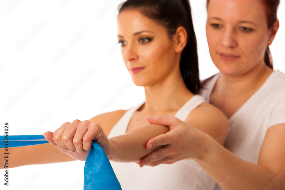 Physiotherapy - therapist doing arm strenghteninh excercises with a ...