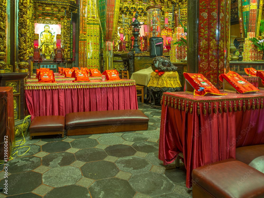 Taipei, Taiwan - October 04, 2016: Coloured altars and kneelers in a ...