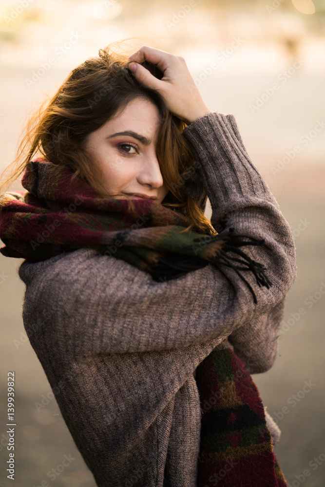 Woman posing in sweater Stock 写真 | Adobe Stock