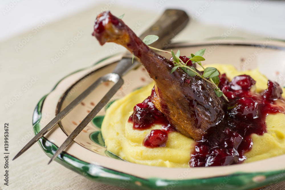Roasted Duck Leg with Mashed Potatoes, Apples and Red Currants in Red ...