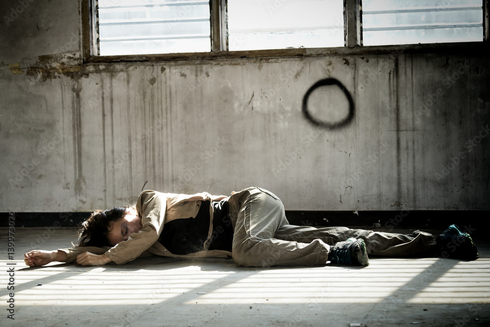 Female laying dead on the ground ,Criminal concept. Stock Photo | Adobe ...