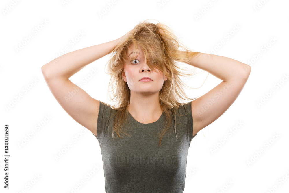 Crazy, mad blonde woman with messy hair Stock Photo | Adobe Stock