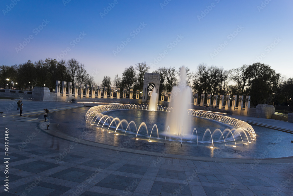 Night-time view of the National World War Two Memorial plaza & Rainbow ...
