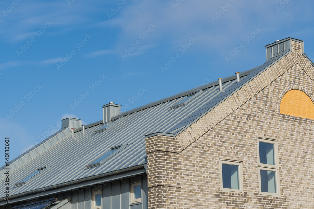 Dach aus Zinkblech mit Schornstein Stock Photo | Adobe Stock