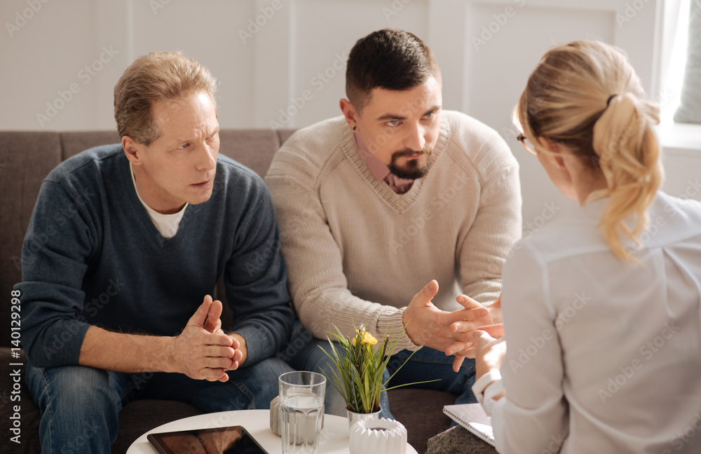 Sad depressed gay couple saving their relationships Stock Photo | Adobe ...
