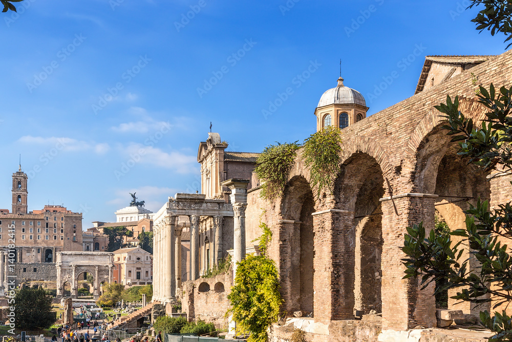 Rome, Italy. Ruins of Roman Forum on left - to right: Tabularia, Arch ...