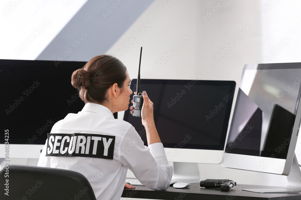 Female security guard on workplace Stock Photo | Adobe Stock