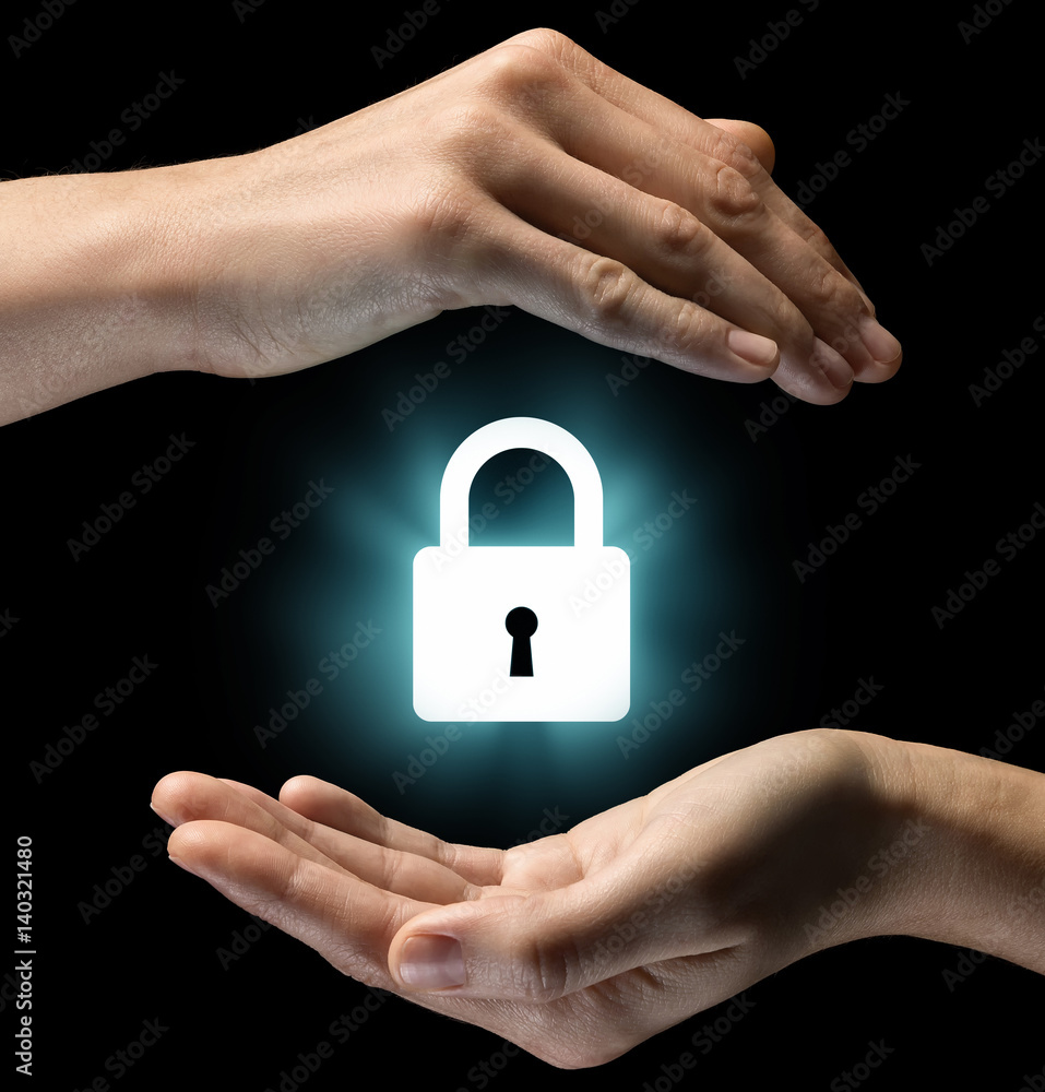 Isolated image of two hands on black background. Lock icon in the ...
