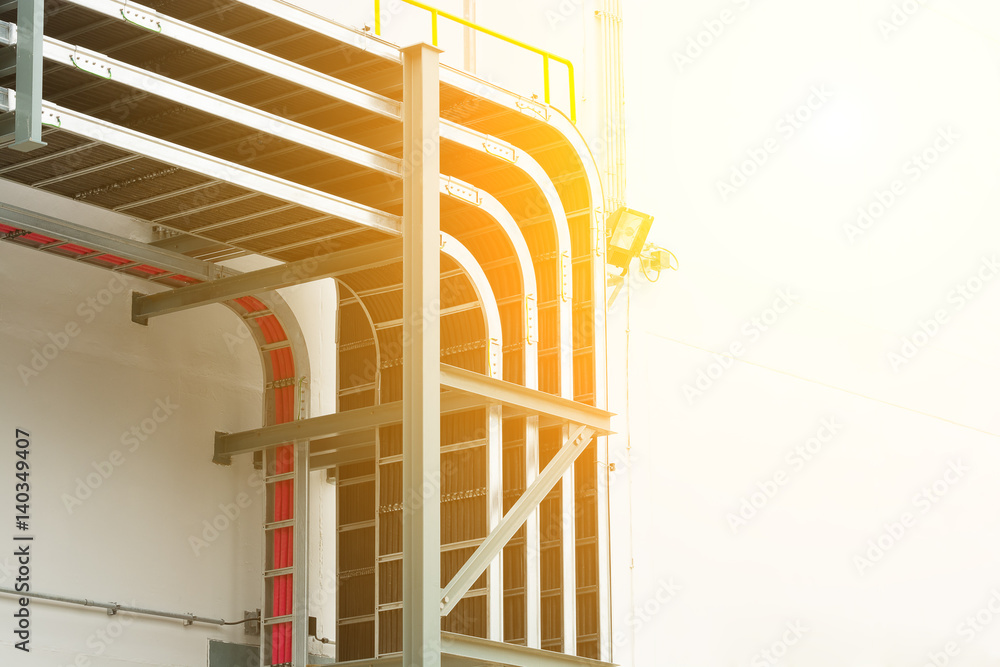 Support cable tray for sub-station building. Stock Photo | Adobe Stock