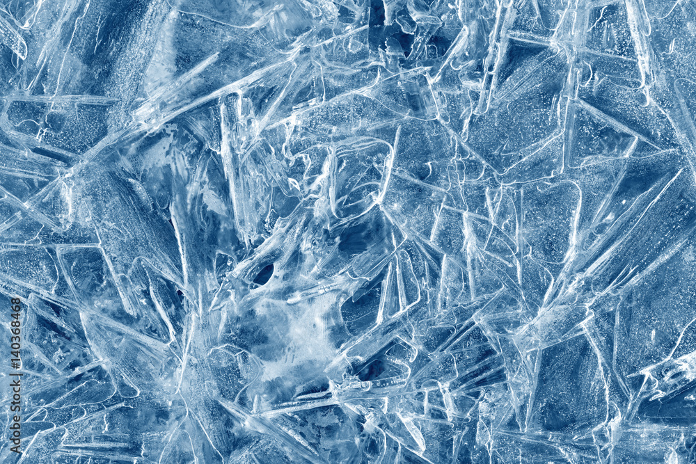 ice background texture. Melting ice with different shapes and cracks ...