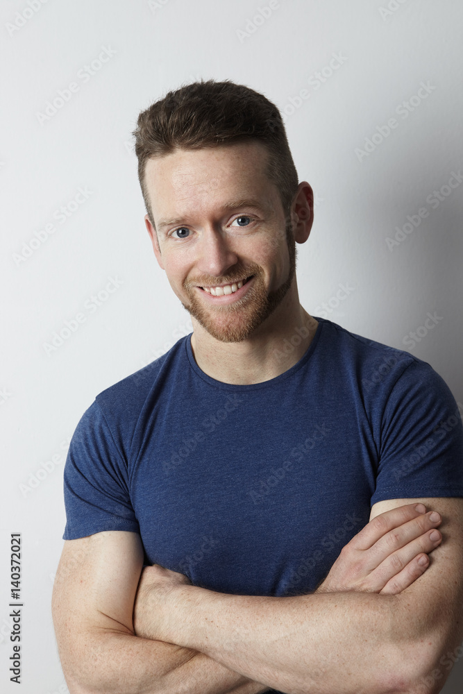 Portrait of cool young guy smiling. White background. Stock Photo ...