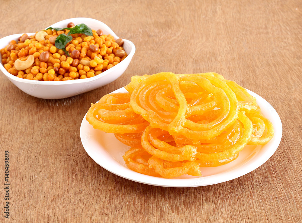 Jalebis, Indian sweet dish, fresh and homemade, in a plate. Stock Photo ...