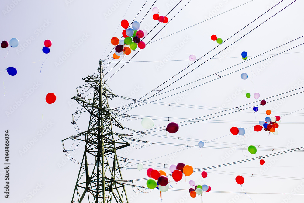Colorful balloons Flying trough Electrical power lines Stock Photo ...