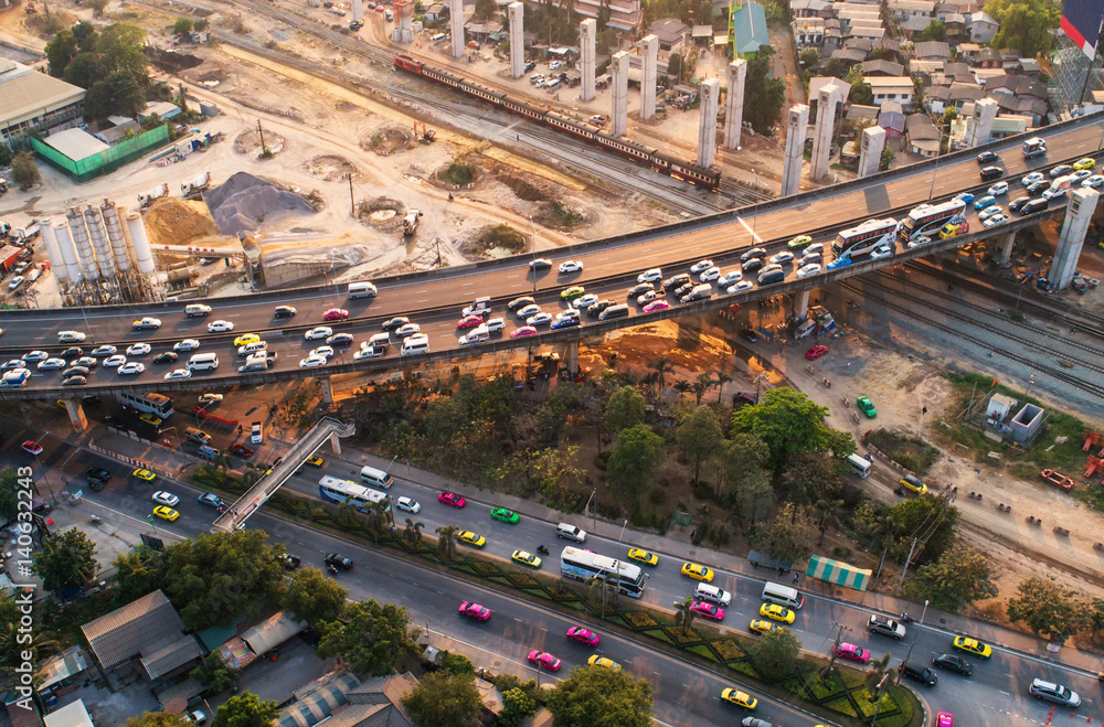 Traffic jam in rush hour,expressway. Freight and passenger train ...