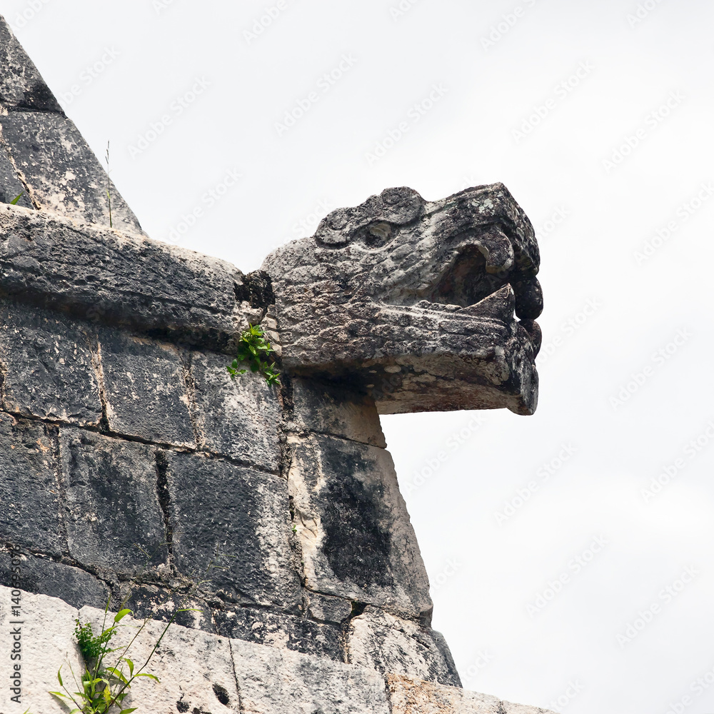 The head of the snake at the base of the pyramid in Chichen Itza ...