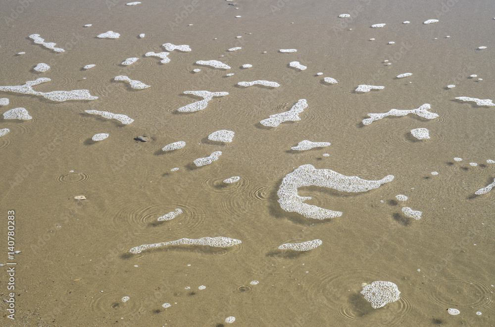 Meerschaum of sea wave on the beach Stock-Foto | Adobe Stock
