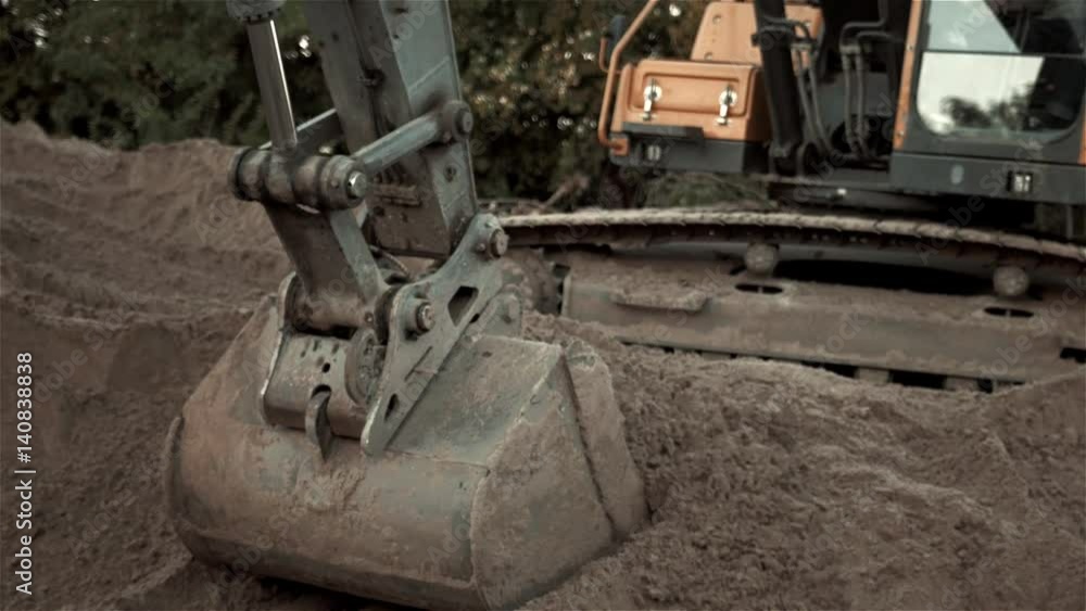 Excavator Digging Sand And Dust Working During Road Works, Close Up ...