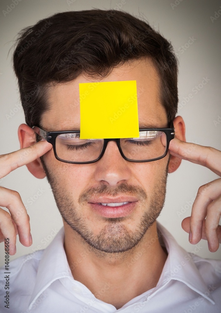 Businessman with sticky note stuck on his forehead Stock Photo | Adobe ...