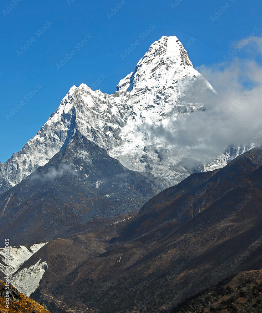 Ama Dablam (6812 m) in the first light of the Sun (view from Phortse to ...
