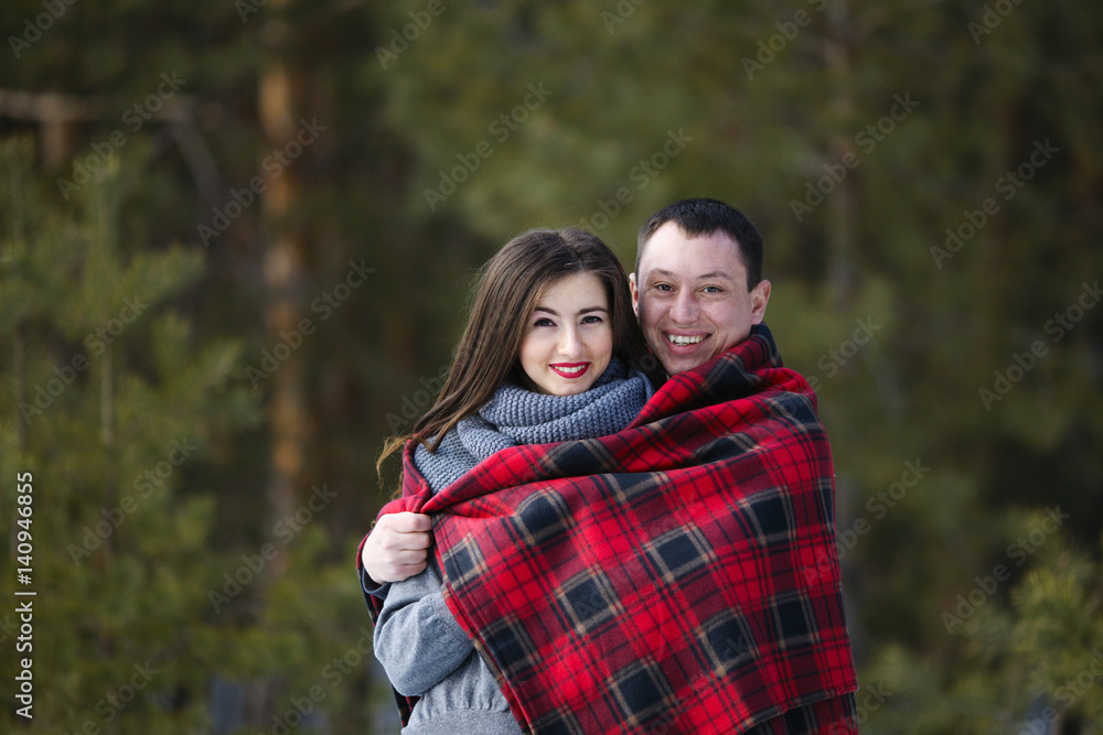 Winter snow couple love story in the forest. Happy romantic smiling ...