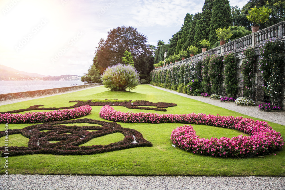 Decorative hedges form geometric shapes in classic, elegant garden ...